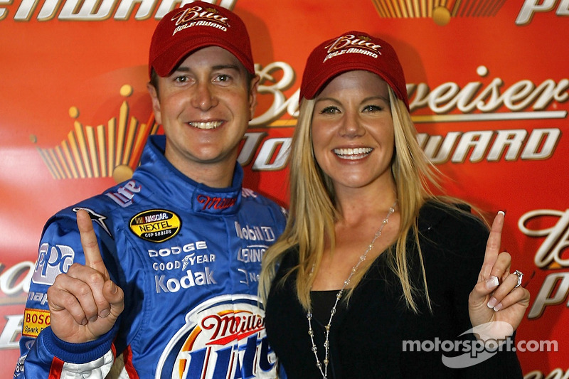 Pole winner Kurt Busch celebrates with fiancée Eva Bryan at Fontana